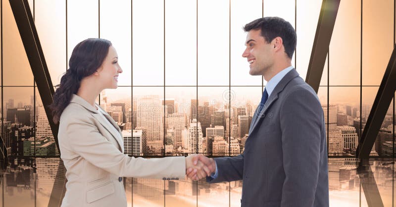 Side View of Male and Female Professionals Shaking Hands Stock Photo ...