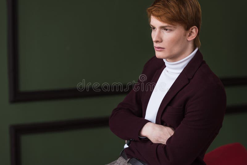Side View of Male Model in Jacket Sitting Stock Photo - Image of jacket ...