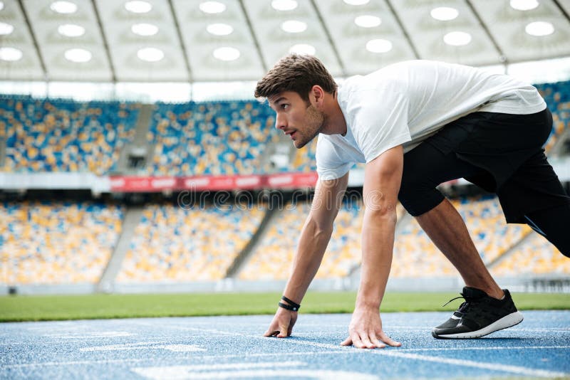 Side View of a Male Runner Ready for Sports Exercise Stock Photo ...