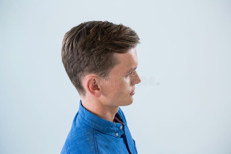 Side View of Man in Blue Shirt Stock Photo - Image of male, hair: 81434348