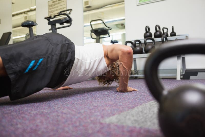 Side View of Man Doing Push Ups in Gym Stock Photo - Image of workout ...