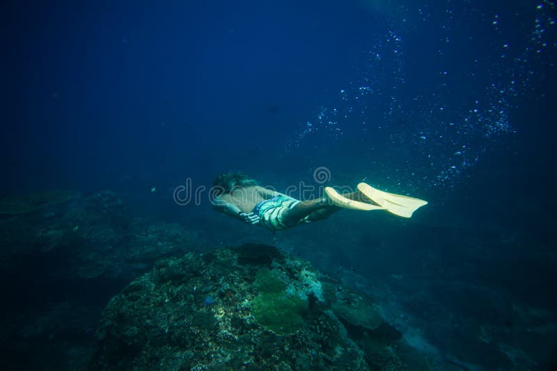Side View of Man in Flippers Diving in Ocean Alone Editorial Stock ...