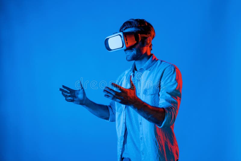 Side View of Man Holding and Moving Gesture while Using VR Goggle ...