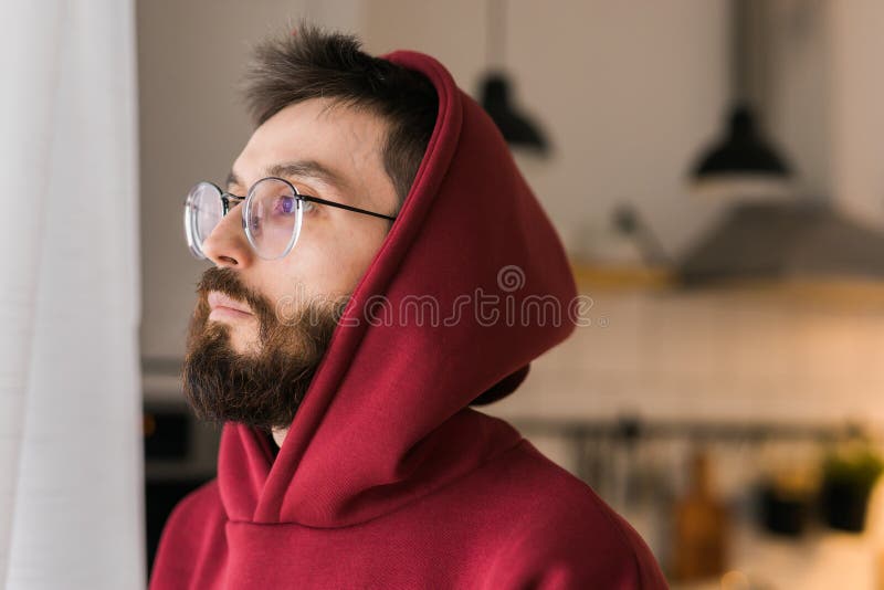 Side View of Man Longing and Looking through Window in Sad Day ...
