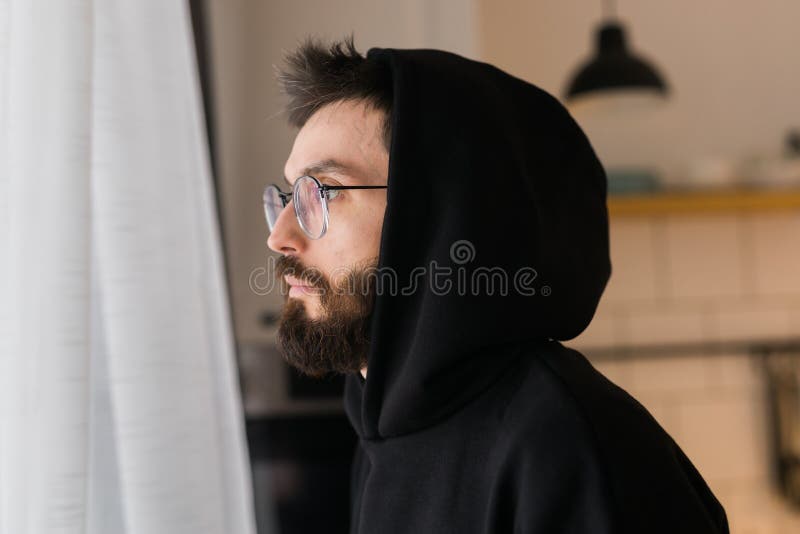Side View of Man Longing and Looking through Window in Sad Day ...