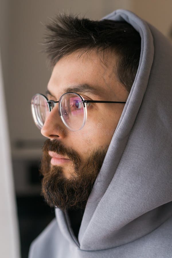 Side View of Man Longing and Looking through Window in Sad Day ...