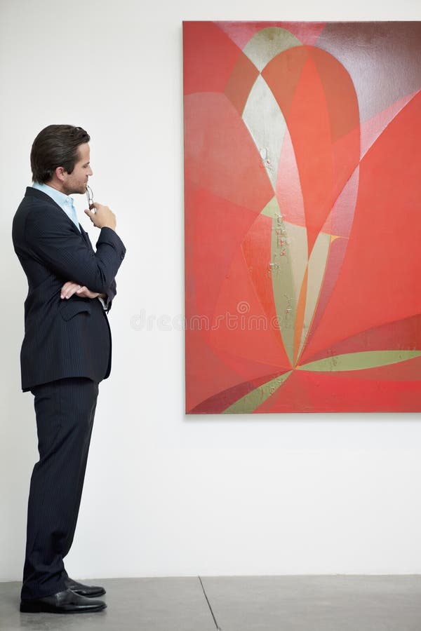 Side View of a Man Looking Intensely Towards Painting Stock Photo ...