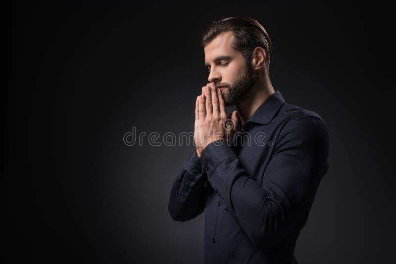 Side view of man praying stock image. Image of isolated - 119821893