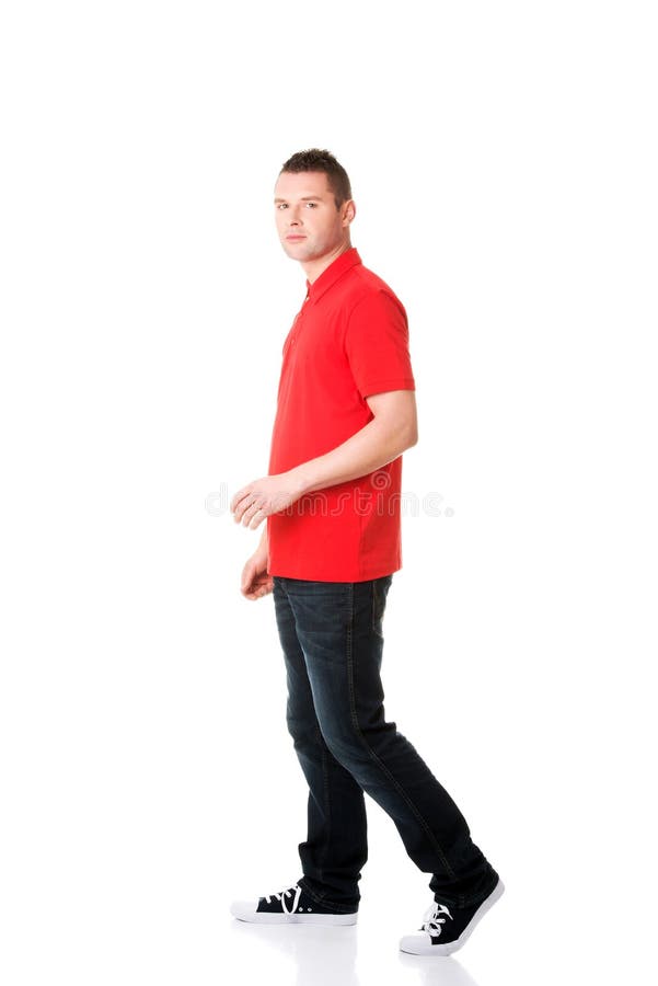 Side View of a Man Walking Forward Stock Photo - Image of background ...