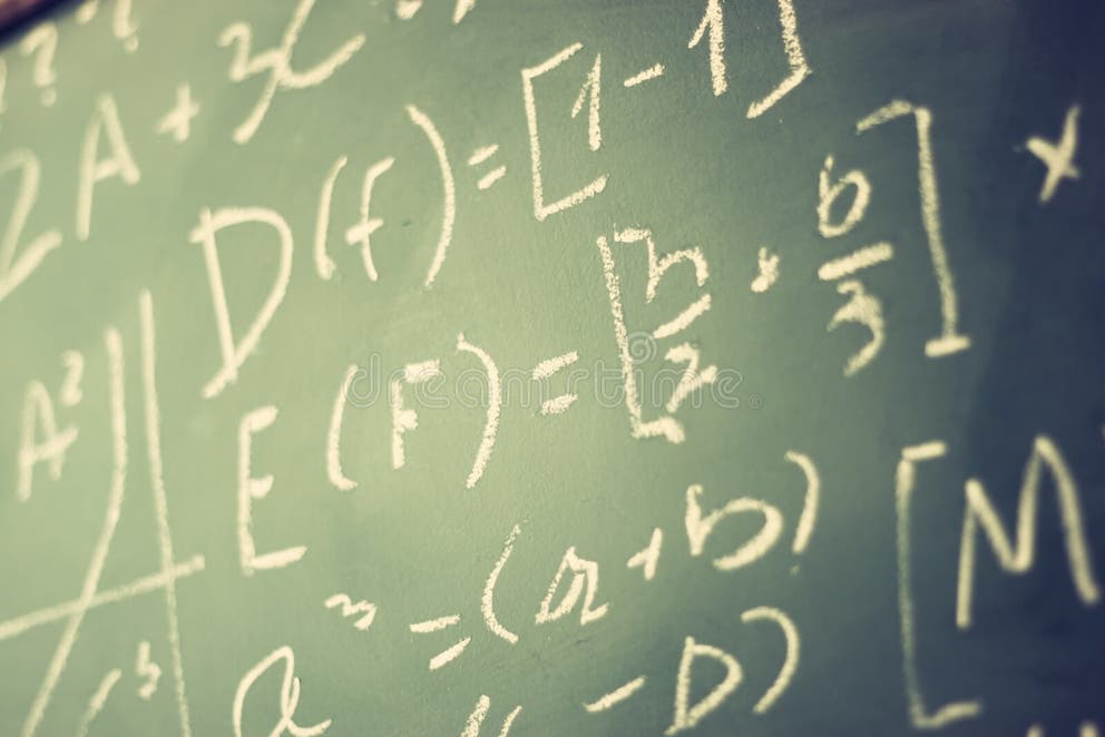 Side View of Math Formulas and Calculation Written Over Chalkboard ...
