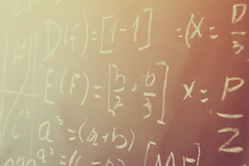Side View of Math Formulas and Calculation Written Over Chalkboard ...