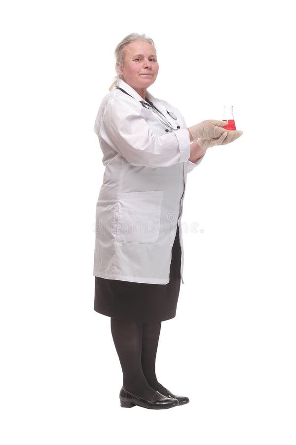 Side View of a Mature Scientist Studying the Red Iquid in the Beaker ...