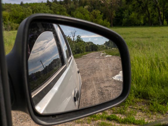 A Side View Mirror of a Car on a Dirt Road Stock Image - Image of ...