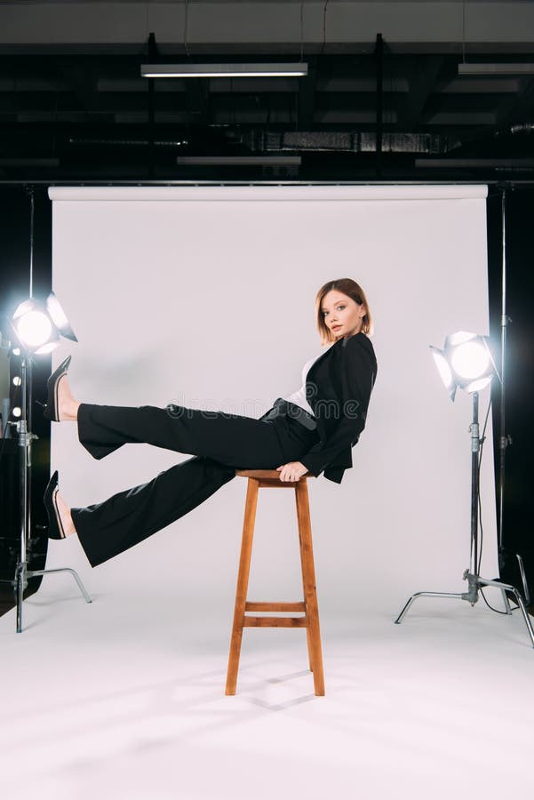 Side View of Stylish Model Looking Stock Photo - Image of tripods ...