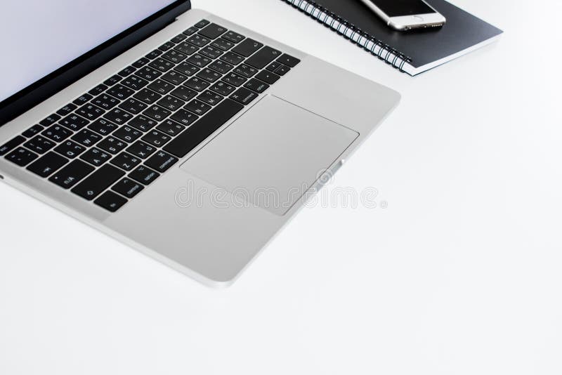 Side View of Modern Technology that Works on a White Desk and Free ...