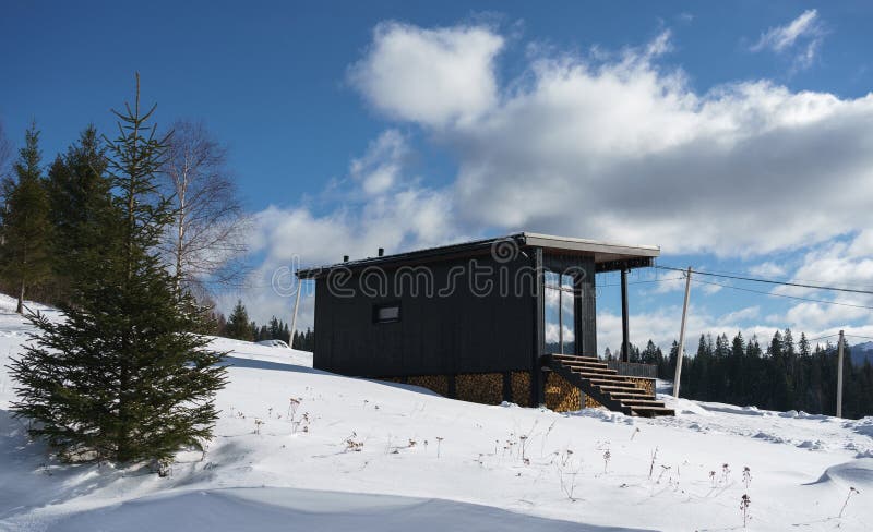 Side View of a Modern Tiny Cabin on Top of Snowy Mountain in Ukraine ...