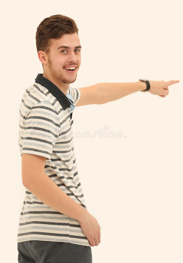 Side View.modern Young Man Pointing Forward and Looking at the Camera ...