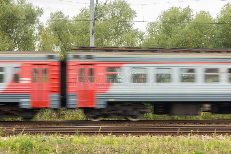 Side View of the Moving Train. Electric High Speed Passenger Commuter ...