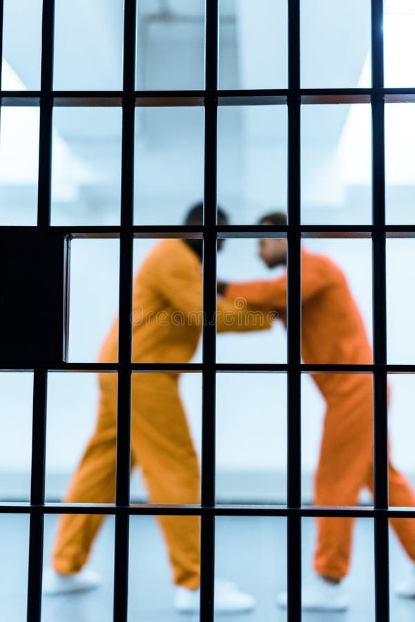 Multiethnic Prisoners in Prison Cell Behind Stock Image - Image of ...