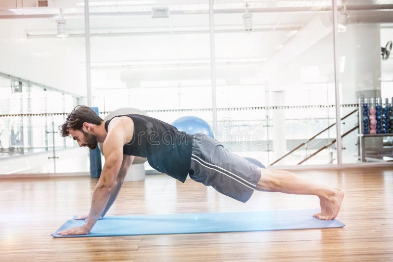 Side View of Muscular Man Doing Push Up on Mat Stock Image - Image of ...