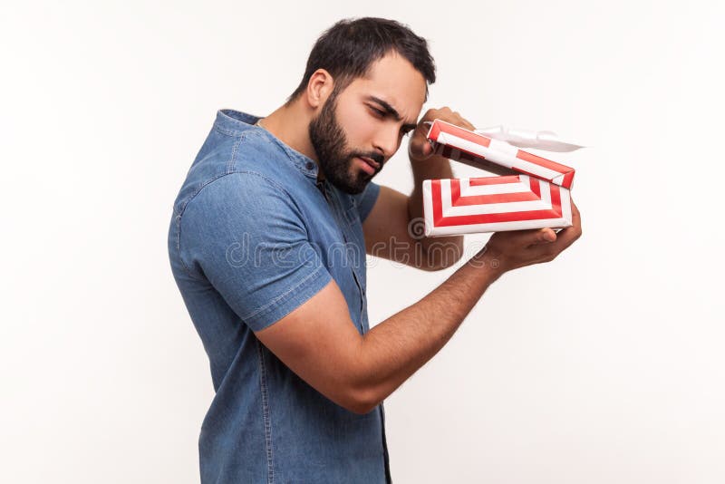 Side View Nosy Curious Man With Beard Taking A Look Inside Gift Box ...
