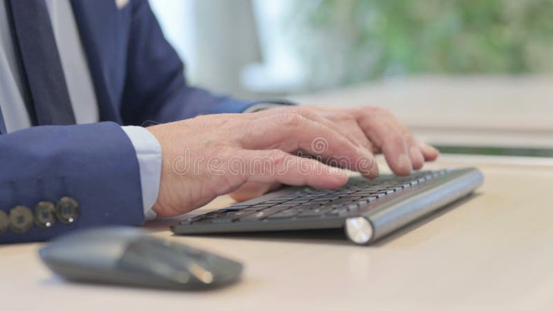 Side View of Senior Old Businessman Typing on Desktop Keyboard Stock ...