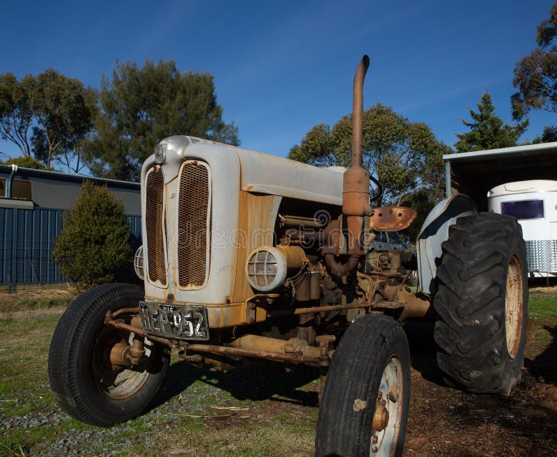 Side View of a Old Rusted Tractor Stock Photo - Image of grass ...