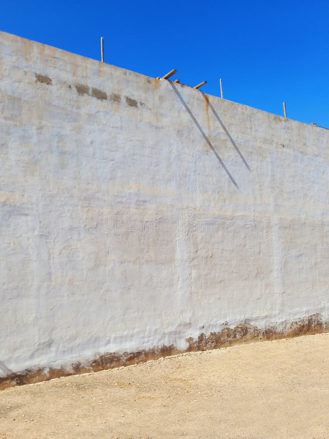 Side View of an Old White Cement Wall Under a Blue Sky. White Stone ...