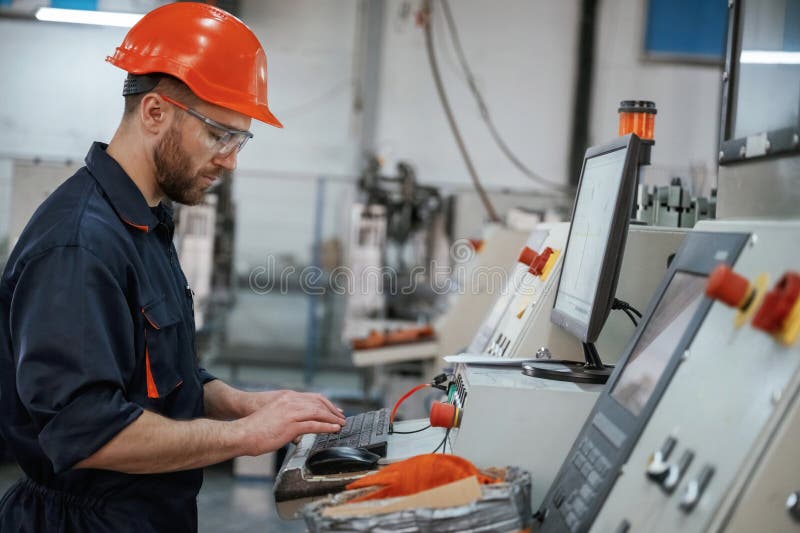 Side View Operating Machine Factory Worker Indoors Hard Hat Stock ...
