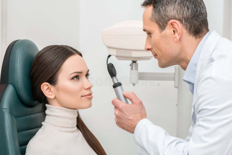 Side View of Patient Getting Eye Test by Oculist Stock Image - Image of ...