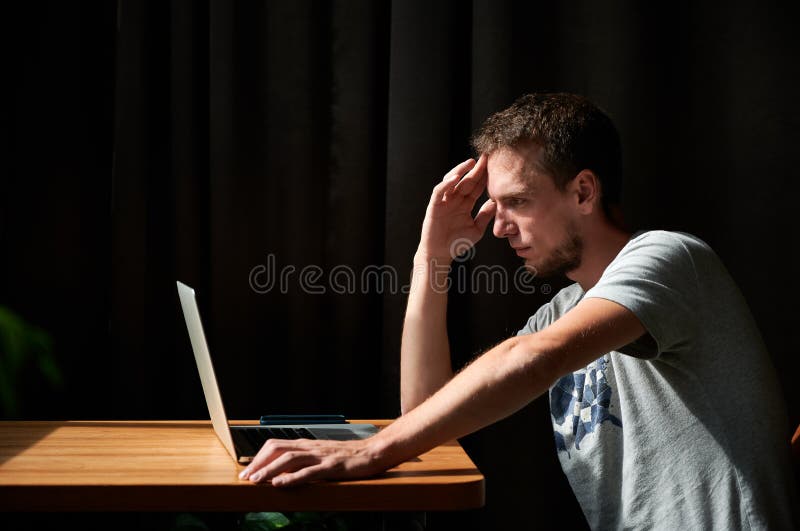 Young Man Thinking and Working in Laptop. Stock Image - Image of ...