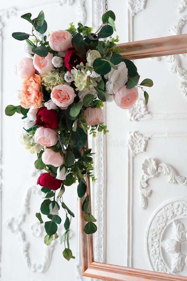 Side View of a Picture Frame Against a White Wall with Patterned Stucco ...
