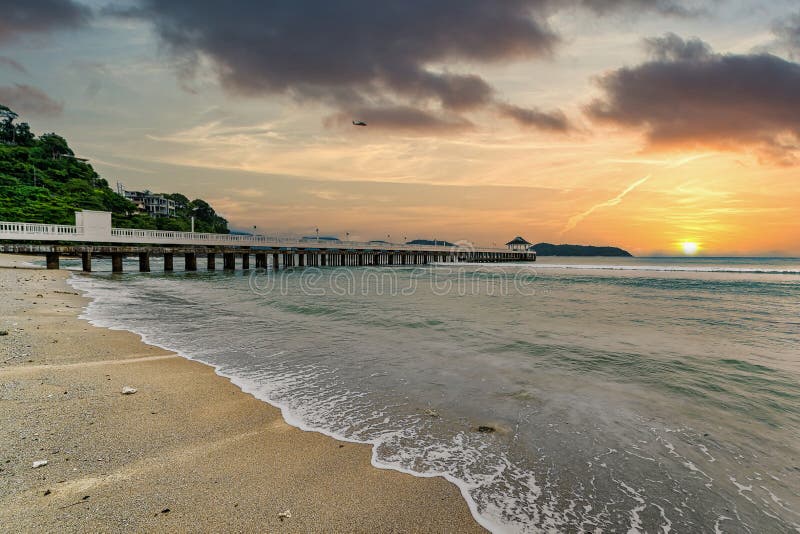 Side View of Pier at the Beach at Sunset Time.Thailand Stock Image ...