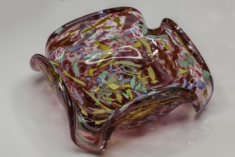 A Side View of a Pink or Red Colored Blown Glass Candy Dish Stock Photo ...