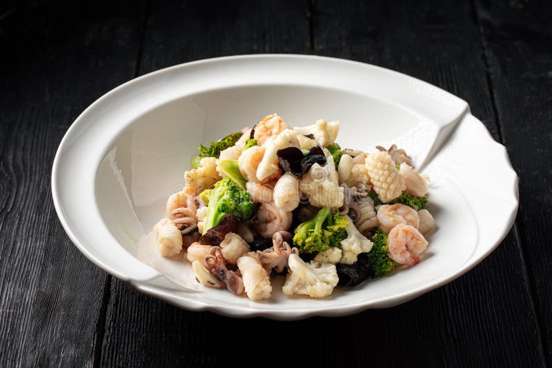 Side View on Portion of Assorted Seafood Dish Stock Image - Image of ...