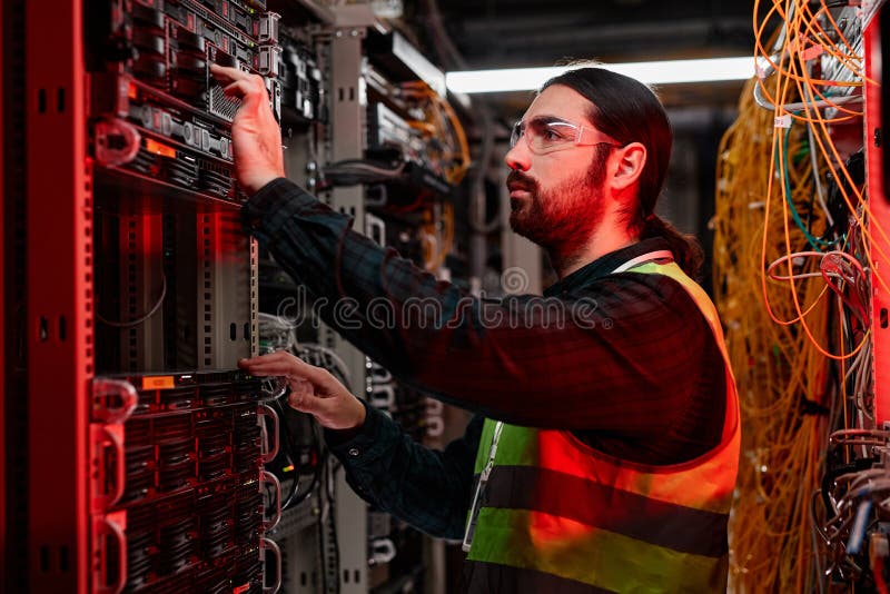 Bearded Network Technician Inspecting Servers in Data Center Stock ...