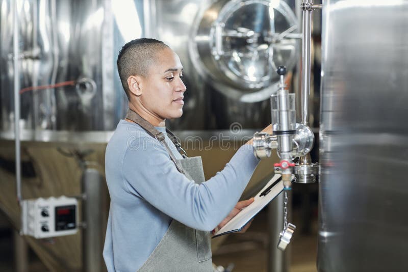 Side View Portrait of Female Brewmaster Stock Image - Image of female ...