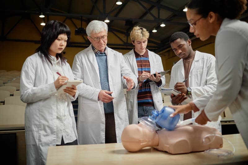 Senior Professor Demonstrating CPR Stock Image - Image of multiethnic, lecture: 378095843