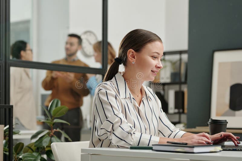 Smiling Woman Using Computer in Office Stock Photo - Image of success ...