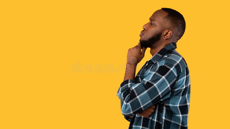 2,231 Black Man Thinking Yellow Background Stock Photos - Free ...