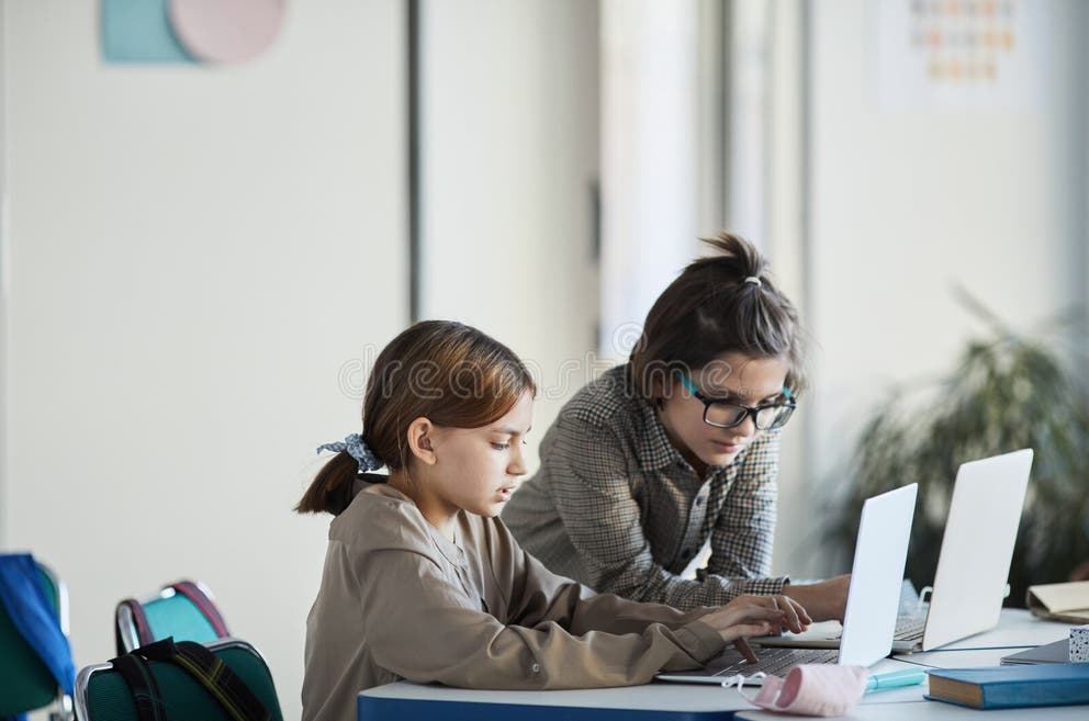 Two Kids Using Computer in School Stock Image - Image of candid, males ...