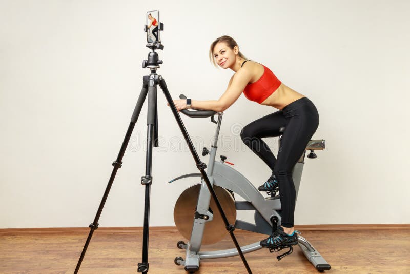 Woman Blogger Recording Video for Her Sport Vlog, Using Mobile Phone ... Woman Blogger Recording Video for Her Sport Vlog, Using Mobile Phone ...