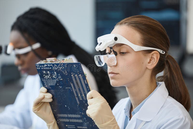 Female Engineer Inspecting Tech Parts Stock Image Image Of Equipment