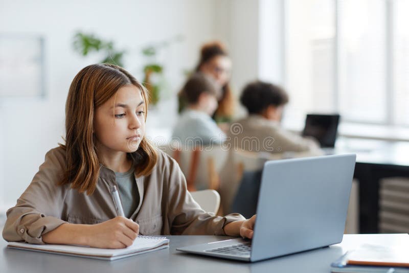 Girl Using Computer in School Stock Image - Image of studying, working ...