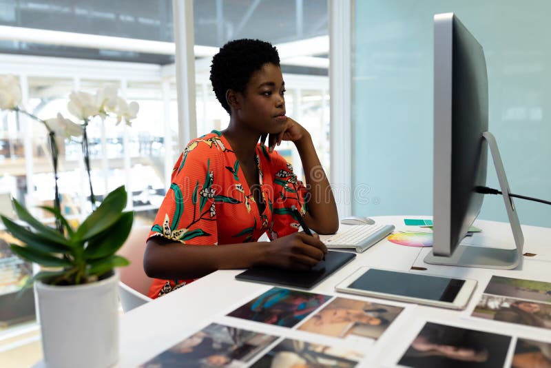 Female Graphic Designer Working on Graphic Tablet at Desk Stock Image ... Female Graphic Designer Working on Graphic Tablet at Desk Stock Image ...