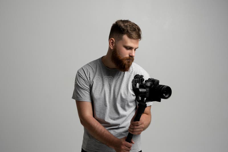 Side View of Professional Bearded Videographer, Cinematographer ...