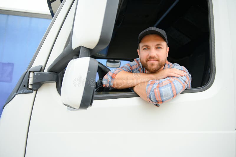 Side View of Professional Driver Behind the Wheel in Truck& X27;s Cabin ...