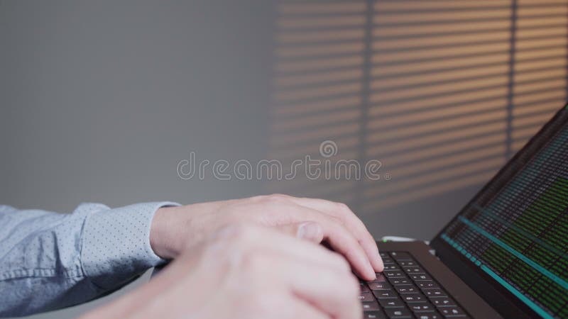 Programmer Man Writing Program Code Sitting at Workplace in Office ...