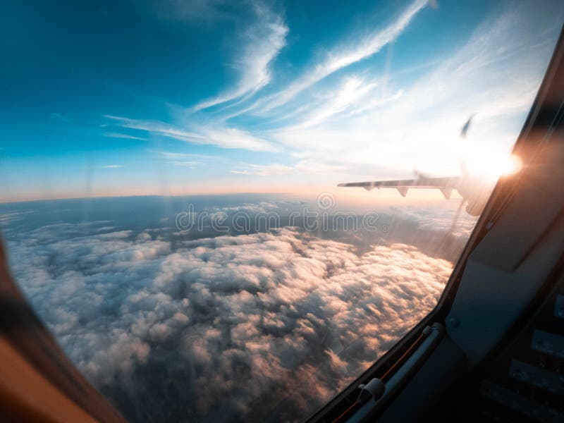 Side View of a Propeller Plane in Flight at Sunset Stock Image - Image ...