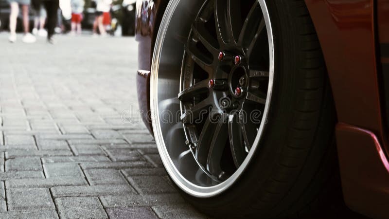 Side View of a Black Sports Car and a Stylish Wheel Stock Image - Image ...